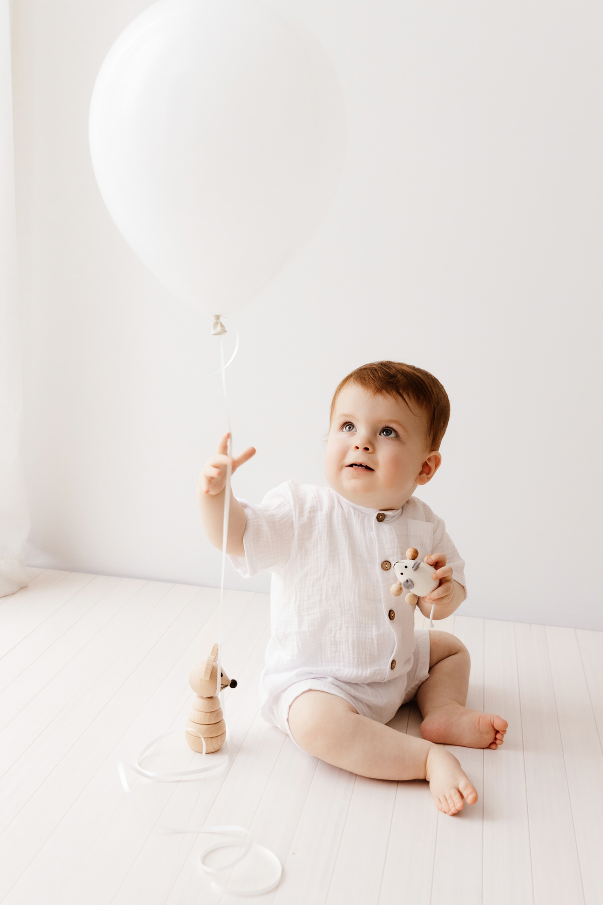 Celebrating Baby's First Birthday with a Cake Smash Photoshoot in ...
